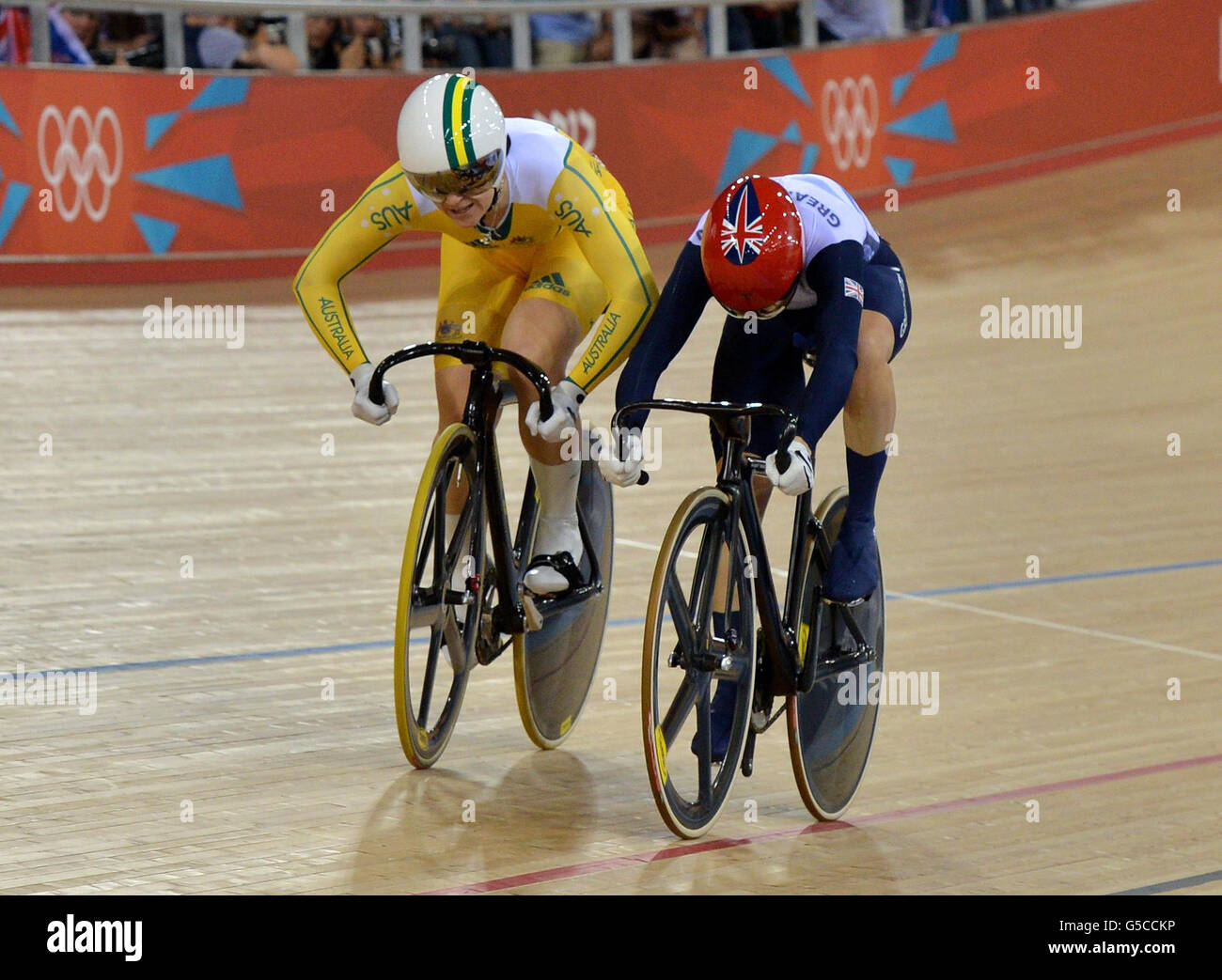 Great Britain's Victoria Pendleton (right) is nudged in her first Final ...