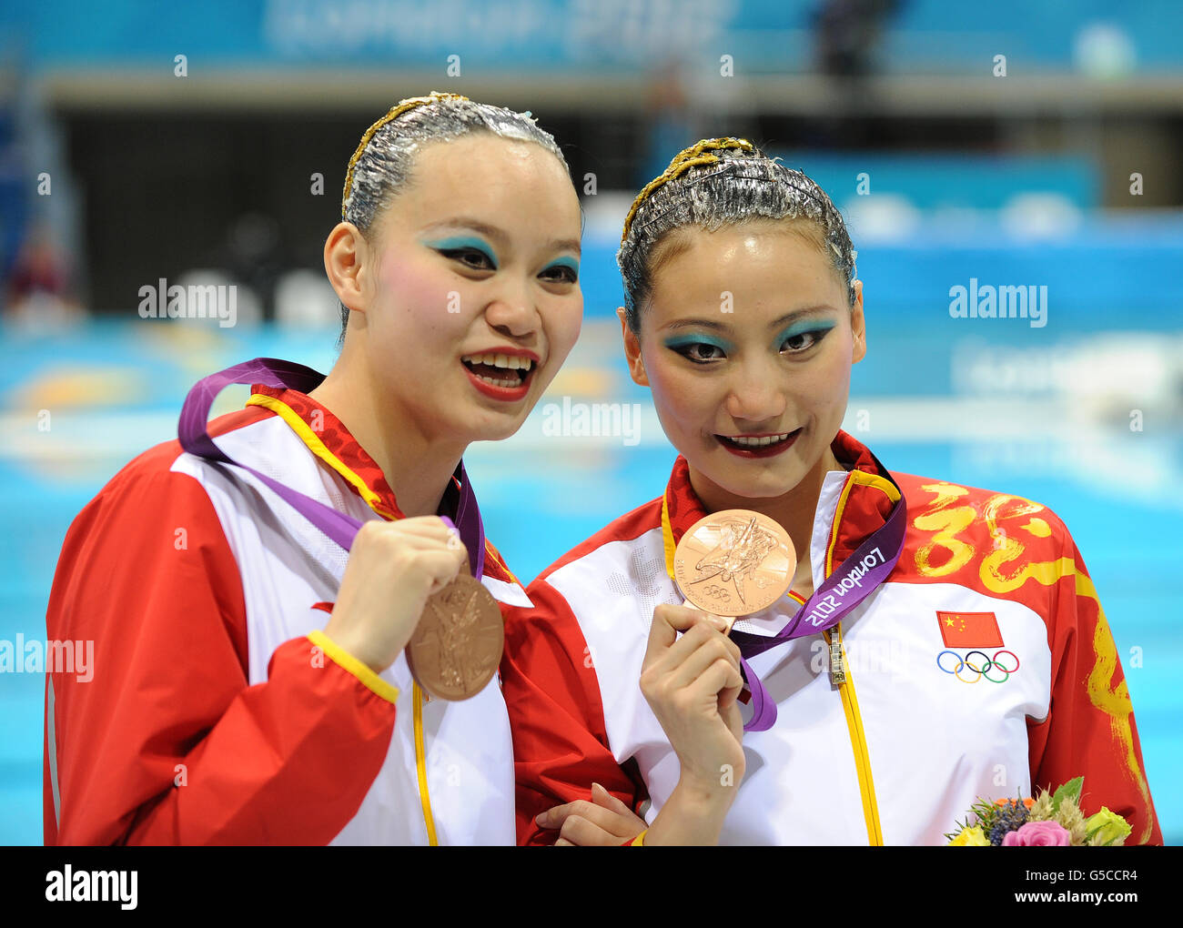 China's Huang Xuechen and Liu Ou with their bronze medals fo the Freel ...