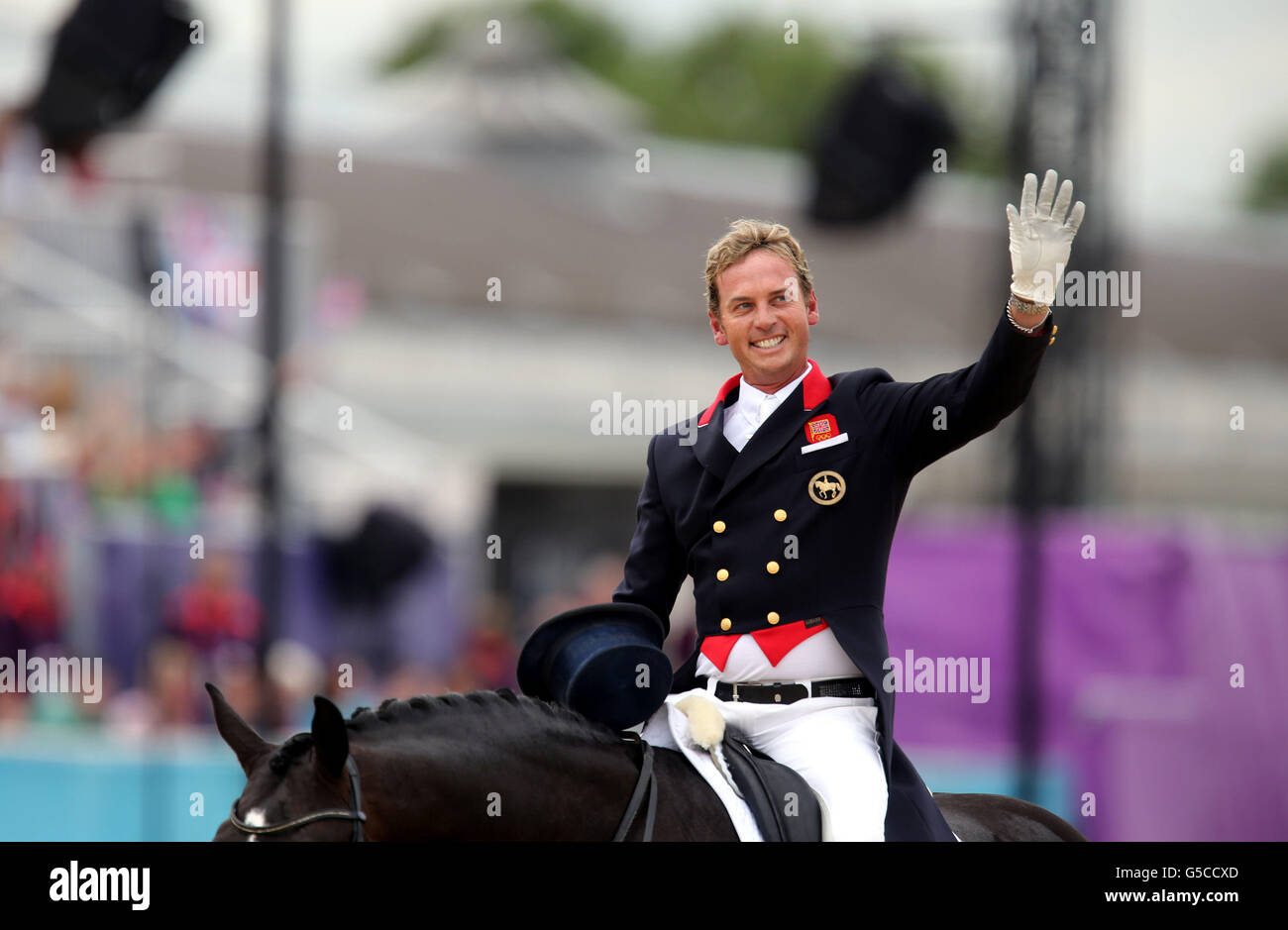 Great Britain's Carl Hester riding Uthopia after completing his test in ...
