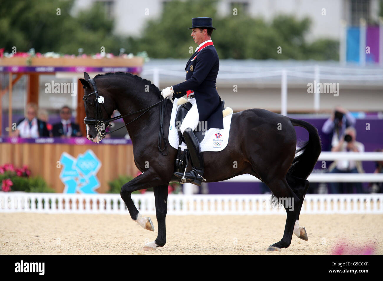 Great Britain's Carl Hester riding Uthopia after completing his test in ...