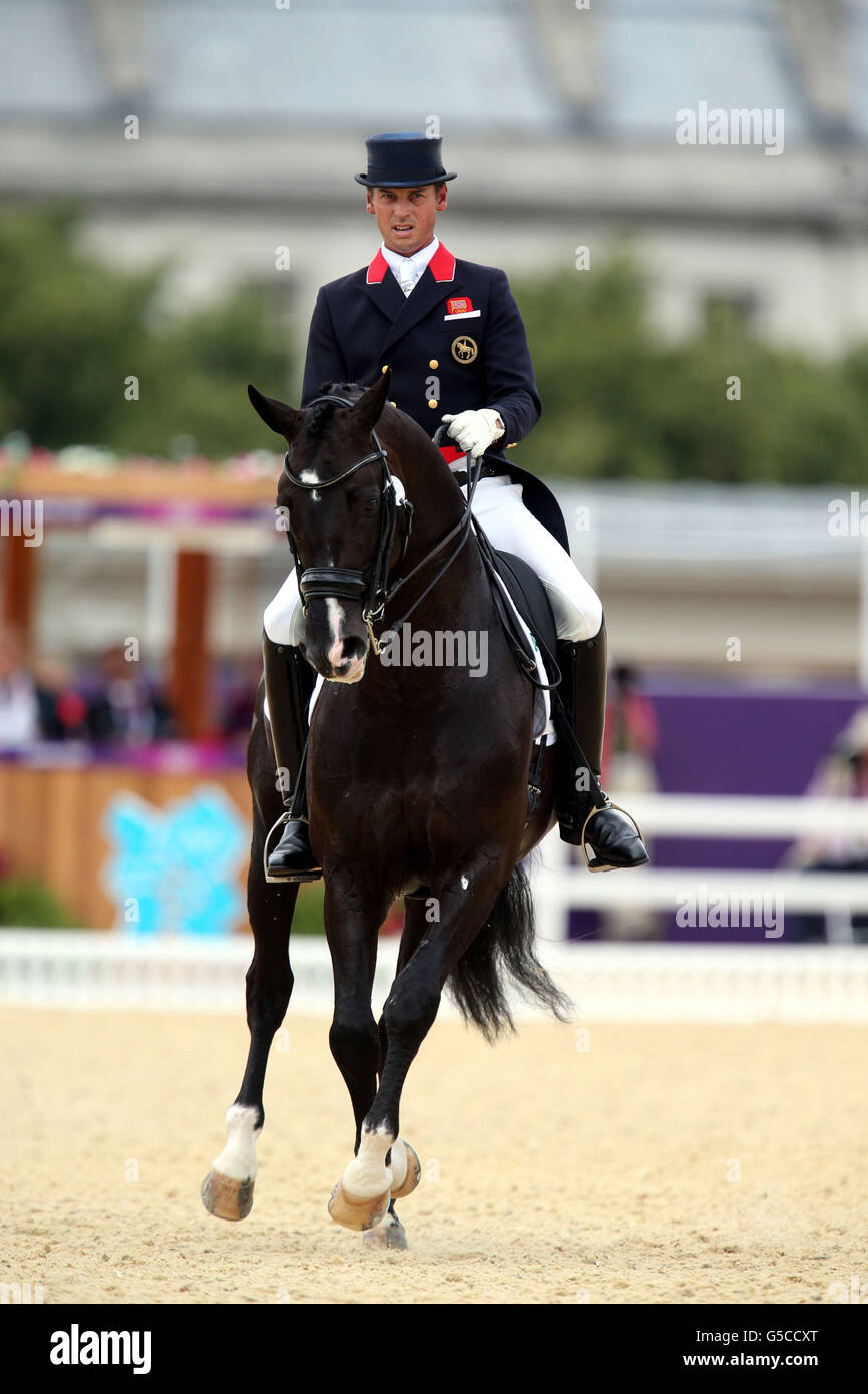 Great Britain's Carl Hester riding Uthopia after completing his test in ...