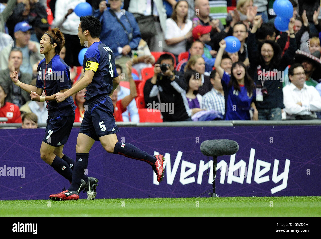 Japans yuli otsu left celebrates scoring a goa hi-res stock photography ...