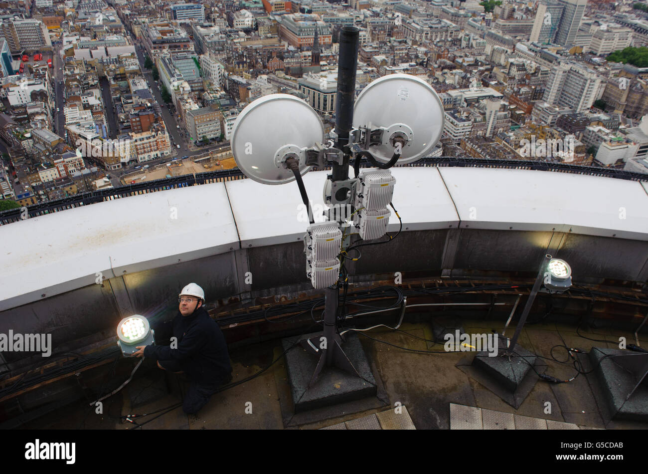 BT Aerial Rigger Mark Gravett adjusts lights on the top of the BT Tower ...