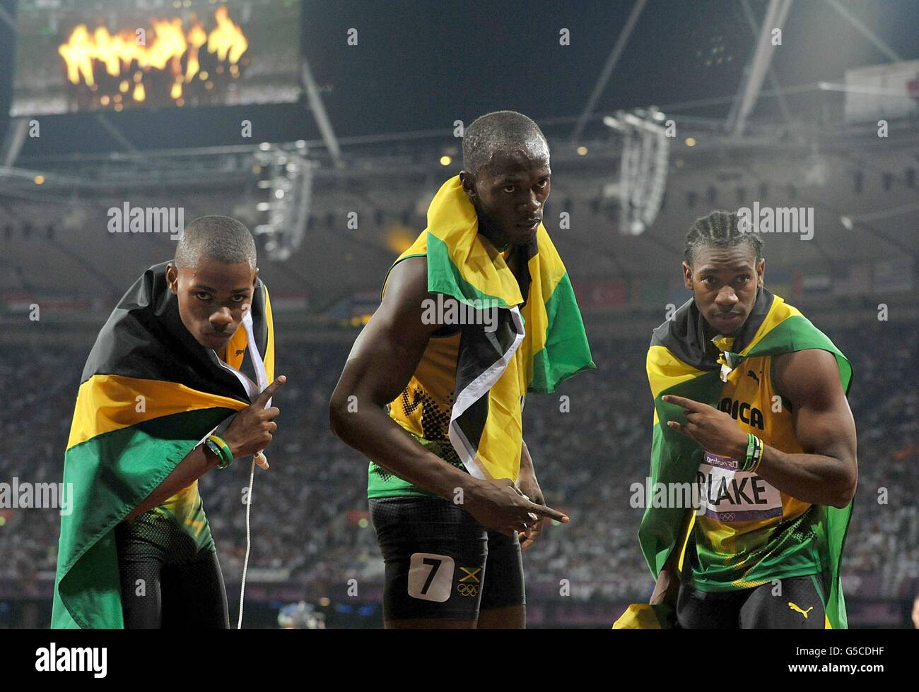 (left-right) Jamaica's Warren Weir, Usian Bolt and Yohan Blake ...