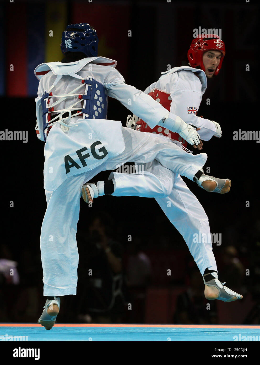 Great Britain's Taekwondo player Martin Stamper (red) during defeat in ...