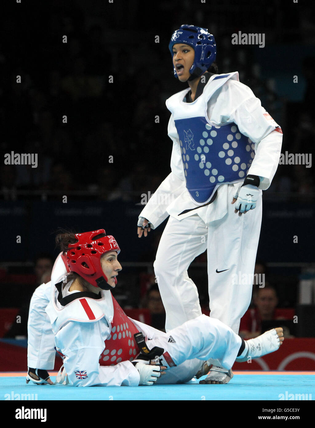 USA's Paige McPherson stands over Great Britain's Sarah Stevenson (red ...