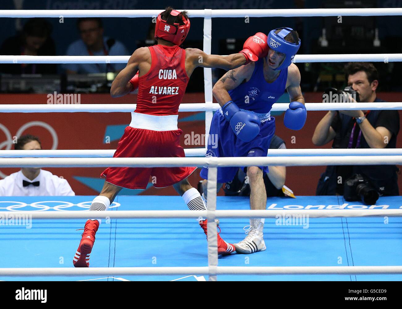 Ireland's John Joe Nevin (blue) during his Bronze Medal bout with Cuba ...