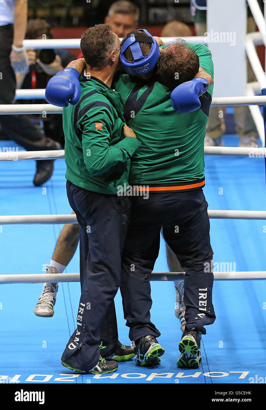 Ireland's John Joe Nevin (blue) celebrates with coaches Billy Walsh and ...