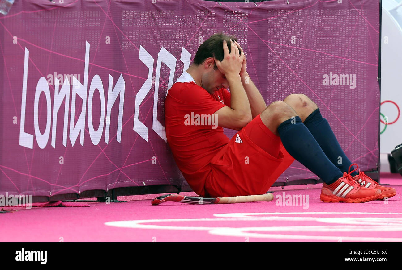 Great Britain's Nicholas Catlin sits dejected after losing against ...