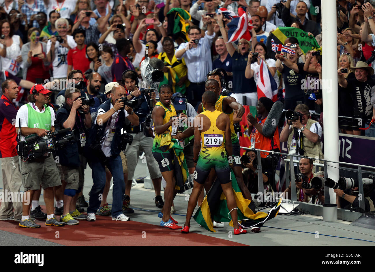 Usain bolt yohan blake warren weir hi-res stock photography and images ...