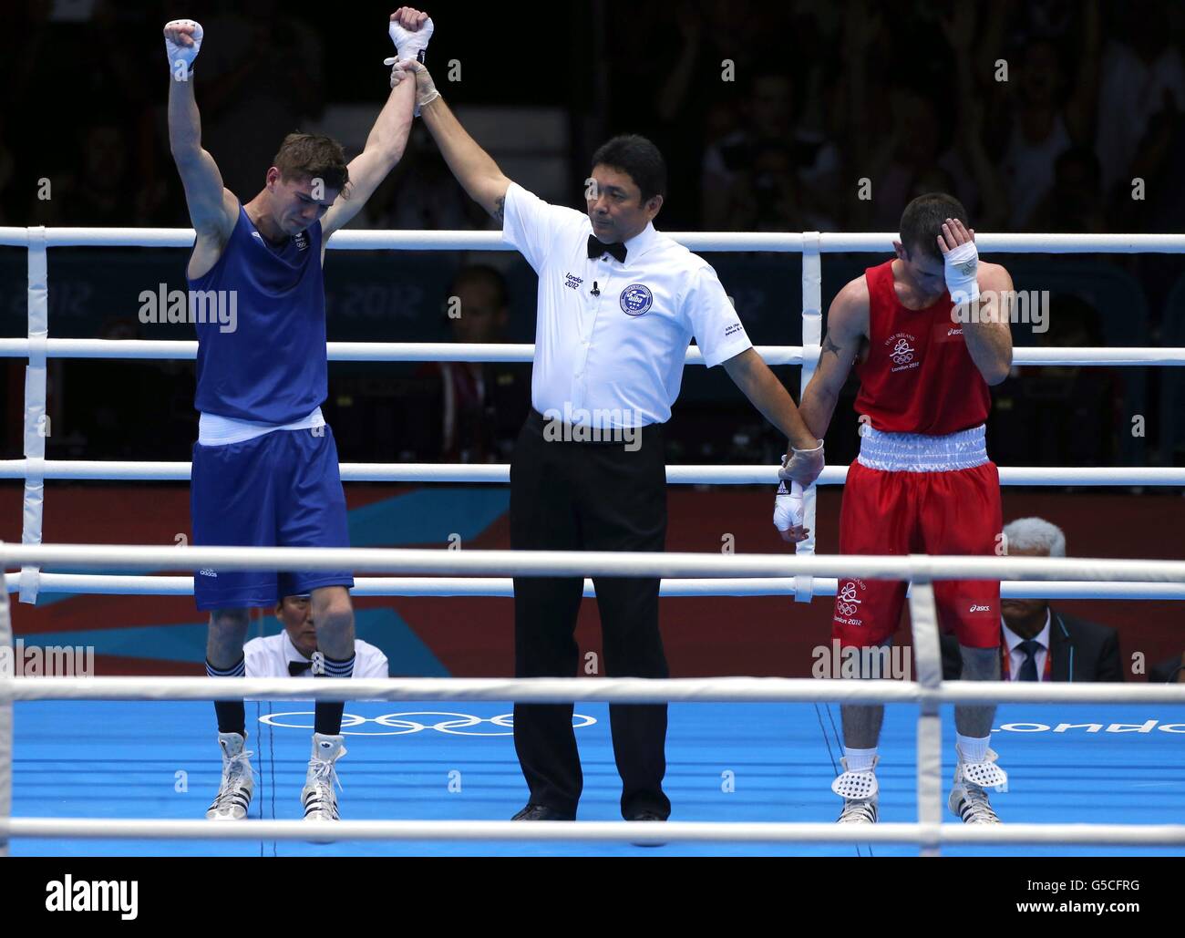 Great Britain's Luke Campbell wins (left) against Ireland's John Joe ...