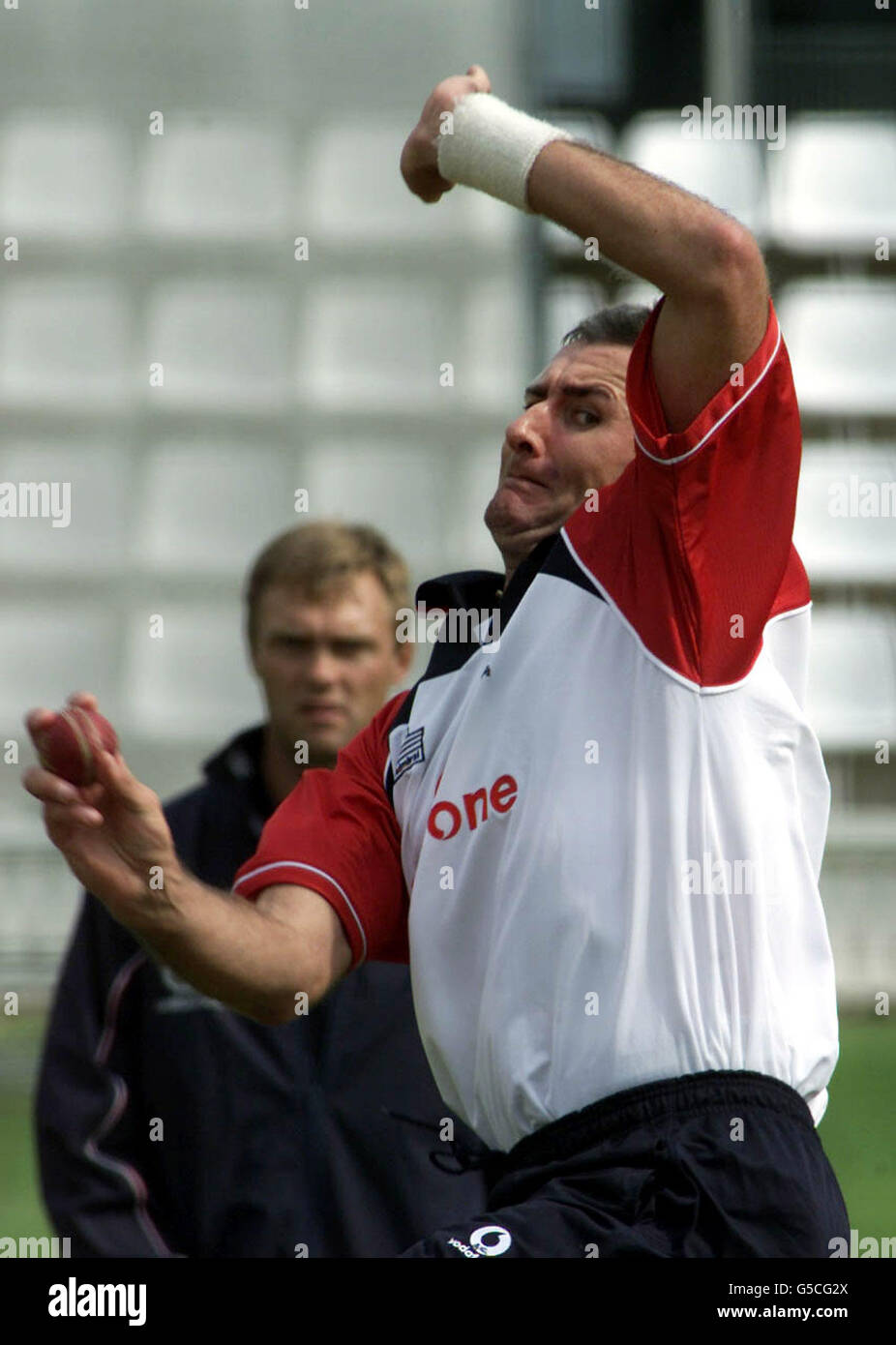 England's cricketer Andrew Caddick bowling in the nets during a ...