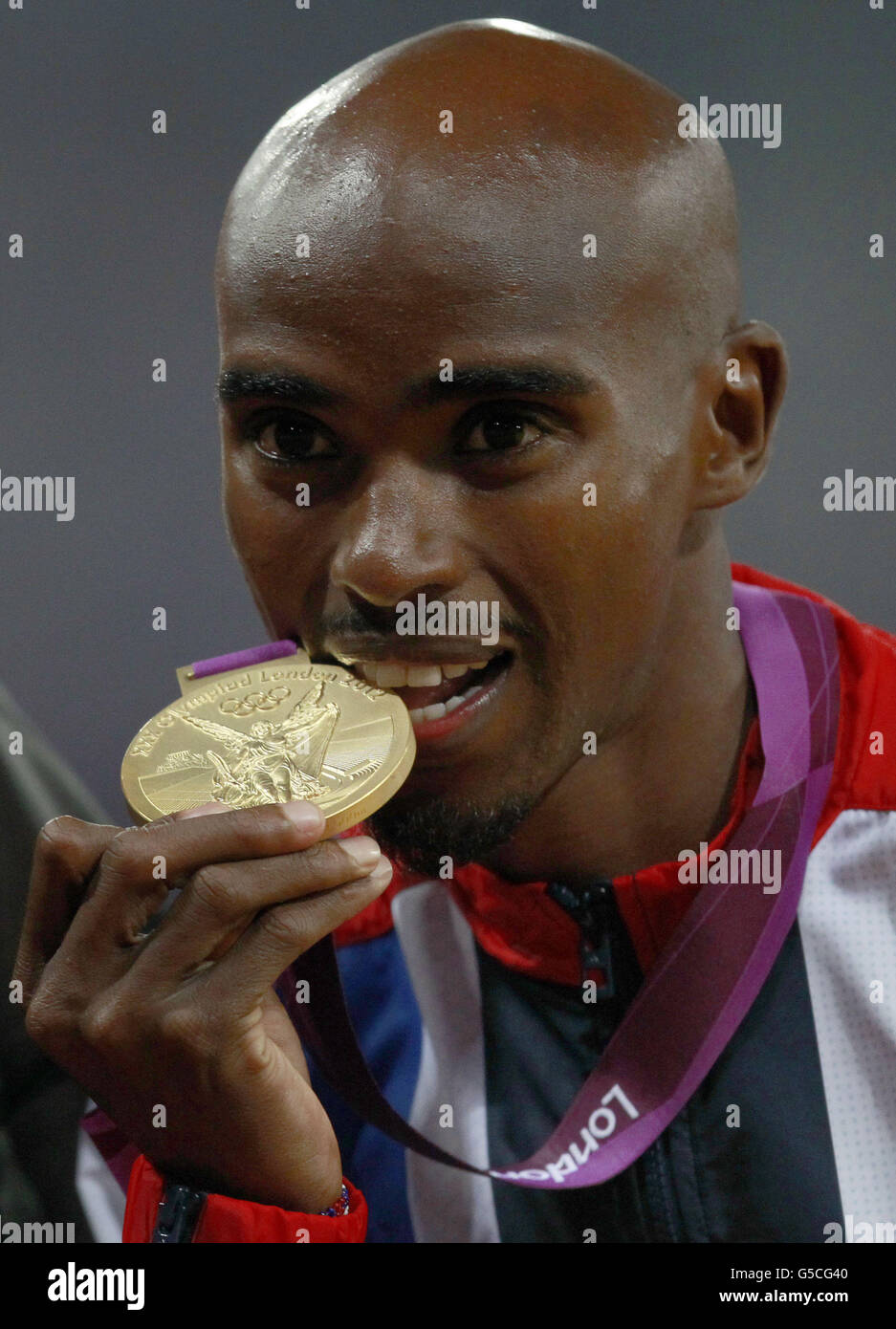 Great Britain's Mo Farah with his gold medal after winning the Men's ...