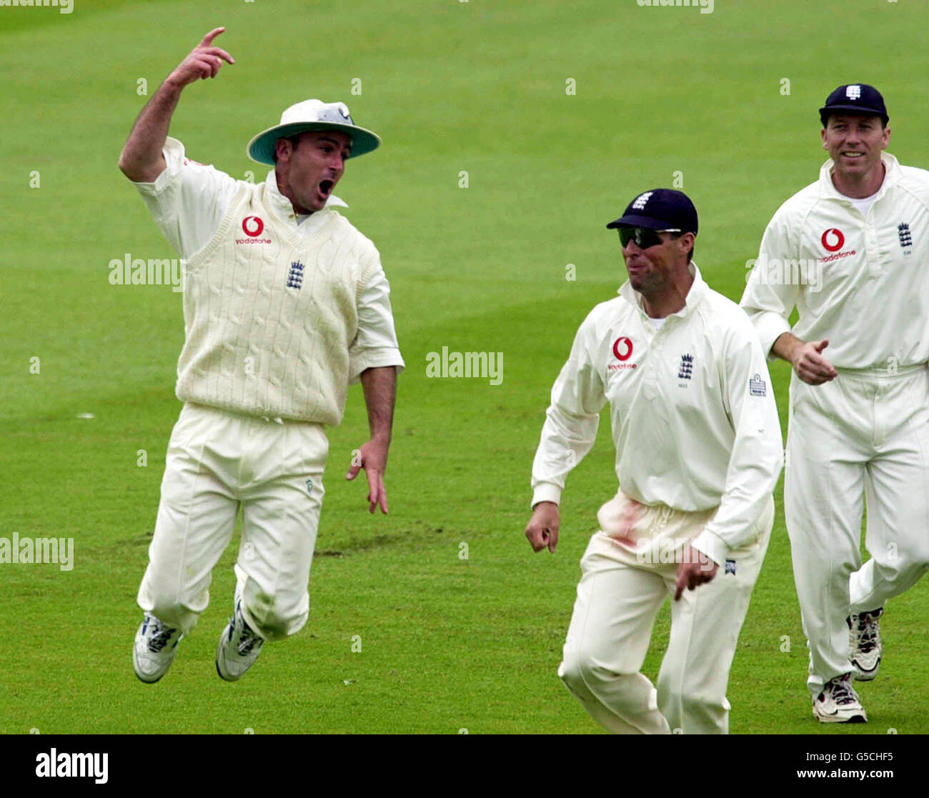 England fielder Graham Thorpe (left) celebrates catching out Pakistan's ...