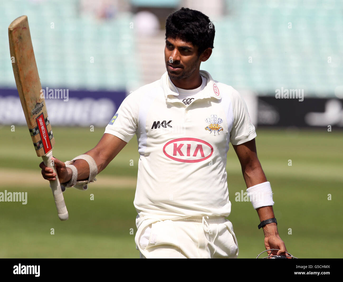 Surreys arun harinath celebrates reaching his century hi-res stock ...