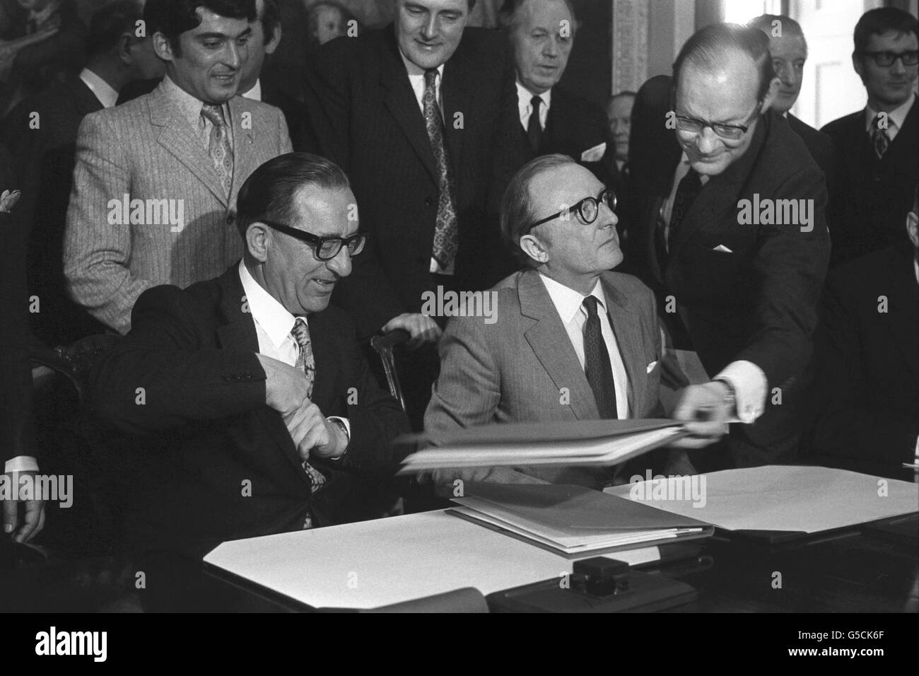 A smile from the Maltese Prime Minister Dom Mintoff as the documents ...