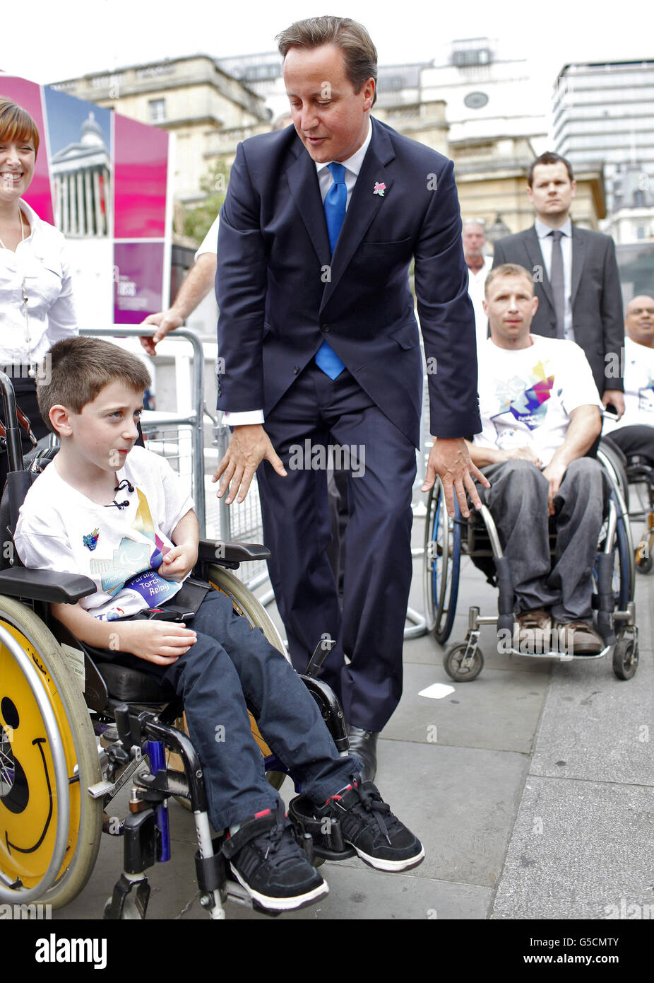 Prime Minister David Cameron meets with flame ambassador Evan Whitton ...