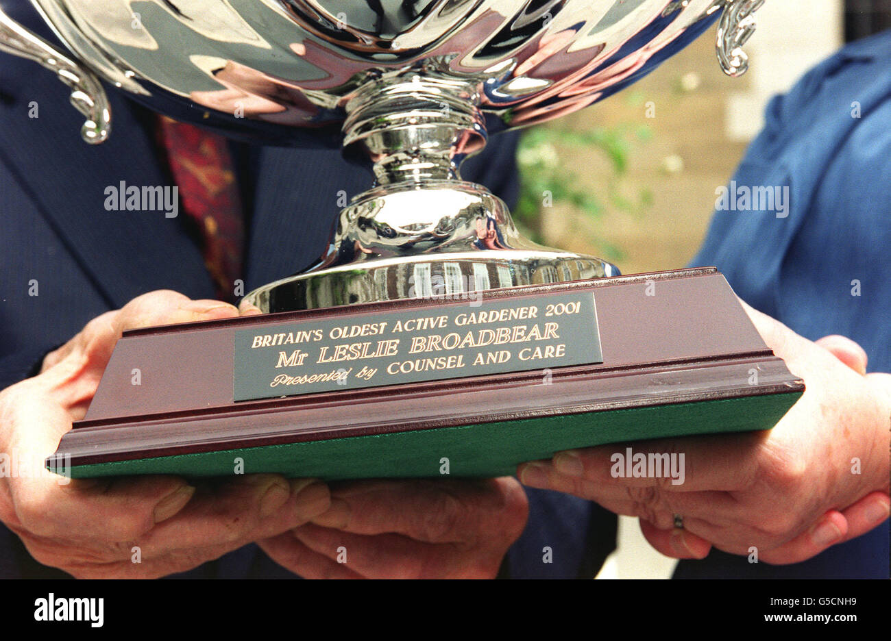 Leslie Broadbear (left), 96, receives the award for Britain's oldest ...