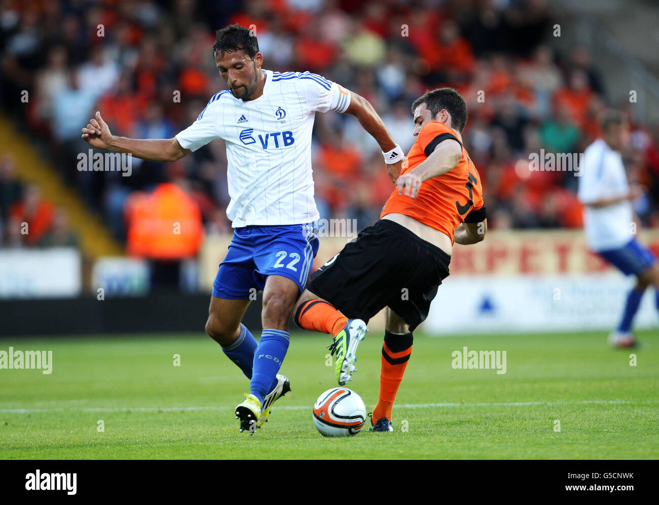 Dundee United Gavin Gunning and Moscow Dinamo's Kevin Kurani (left ...