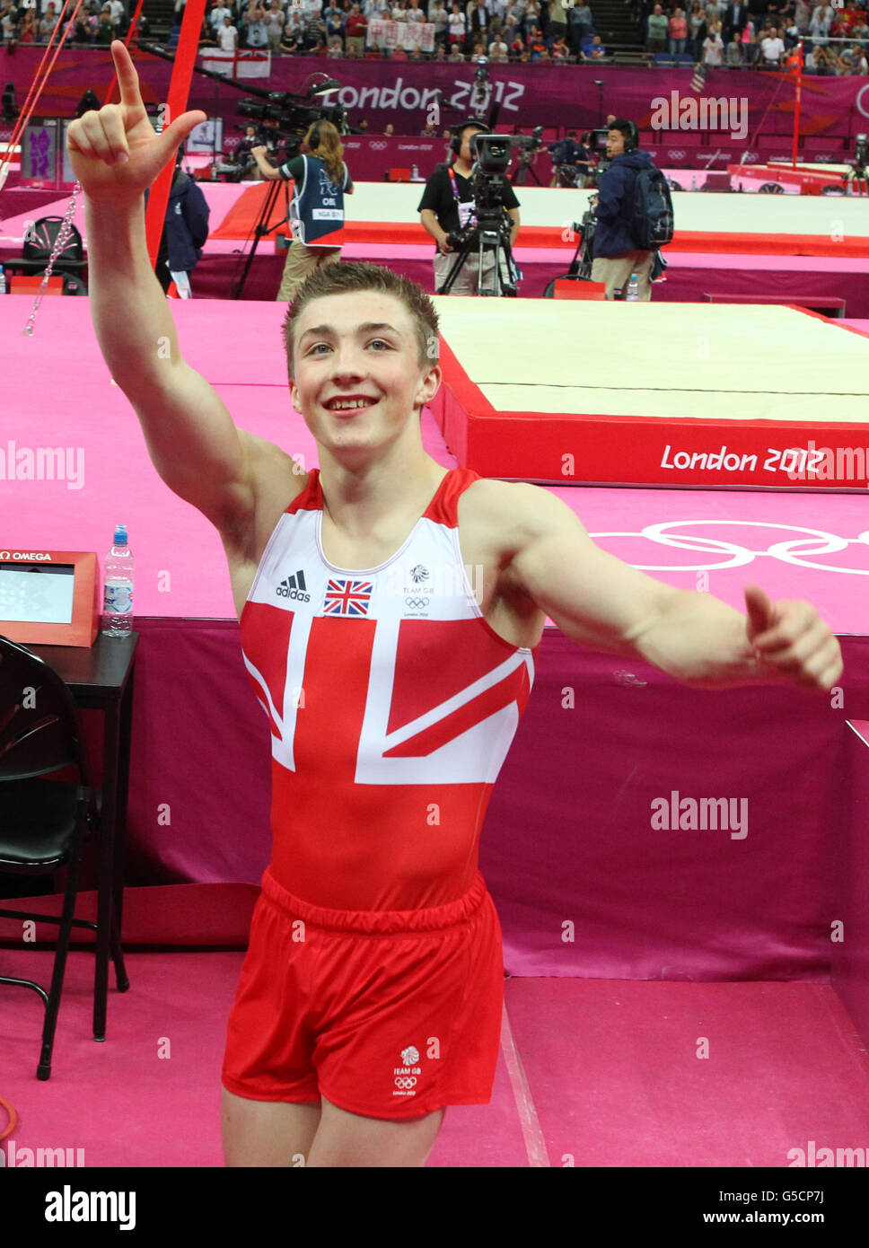 Great Britain's Sam Oldham waves to the crowd after getting a bronze ...