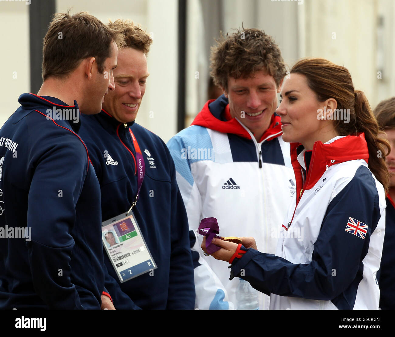 Finn Gold medalist Great Britain's Ben Ainslie shows his gold medal to ...