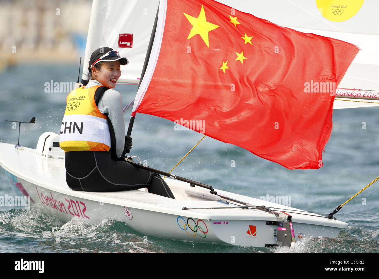 China's Lijia Xu reacts after winning gold in the Laser Radial class at ...