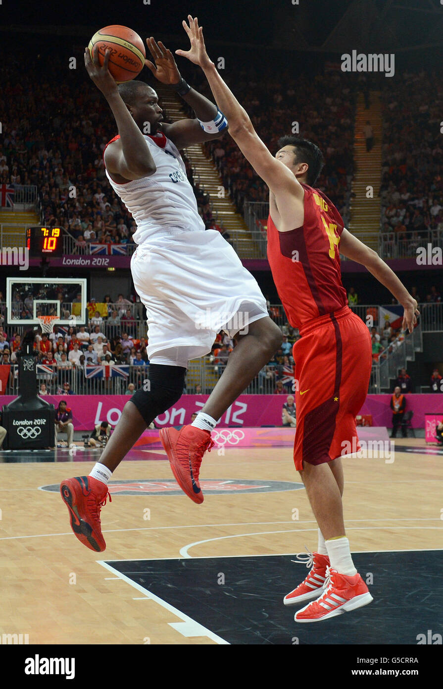 Great Britain's Luol Deng and China's Peng Zhou in action during the ...