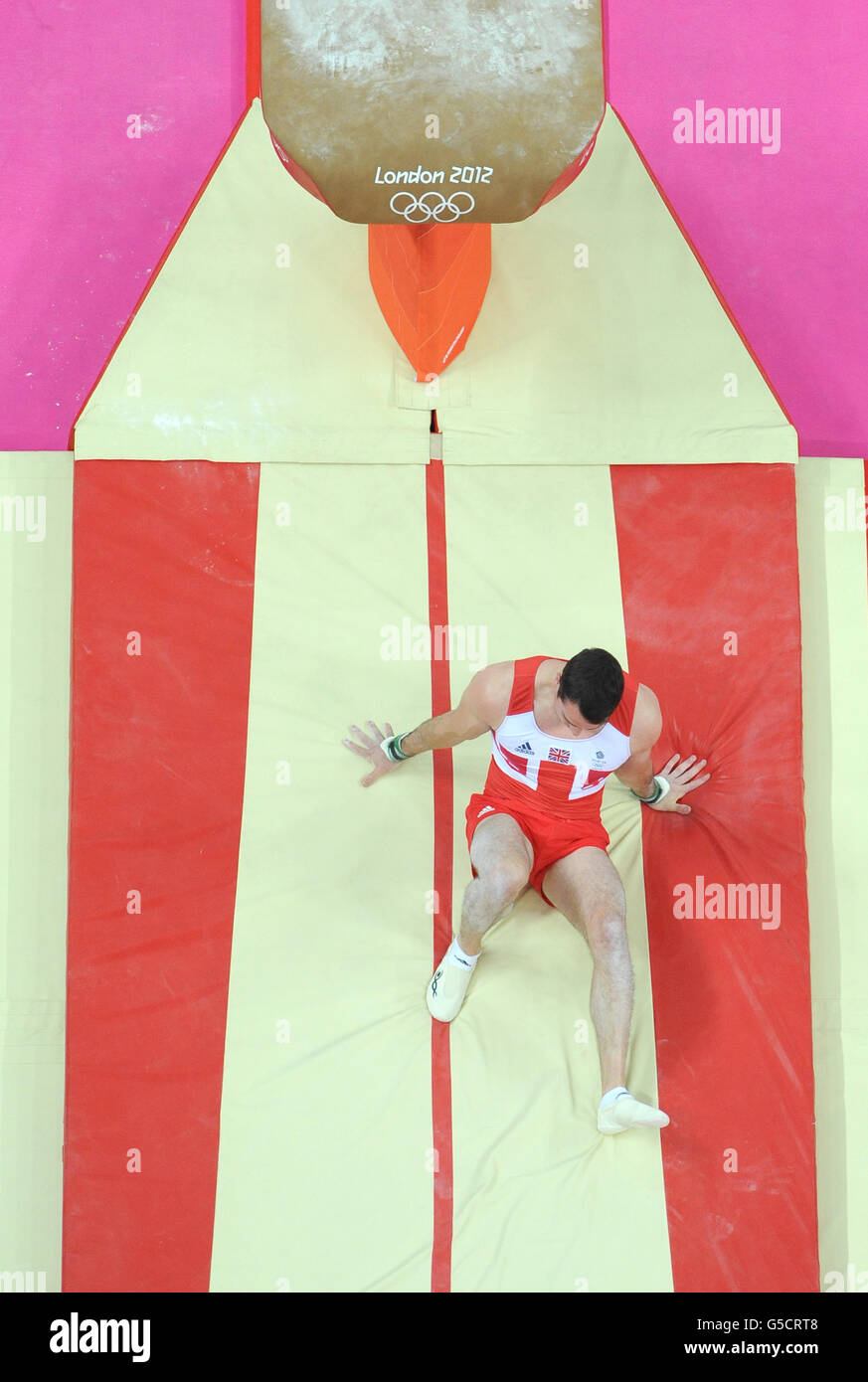 Great Britain's Kristian Thomas stumbles as he lands during the ...