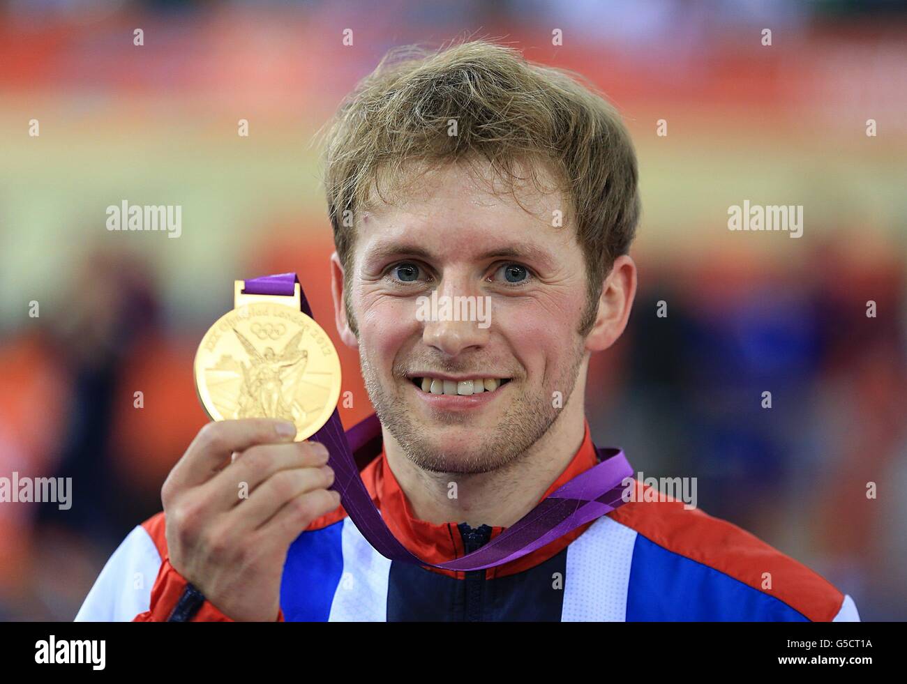 Great Britain's Jason Kenny celebrates with his gold medal after ...