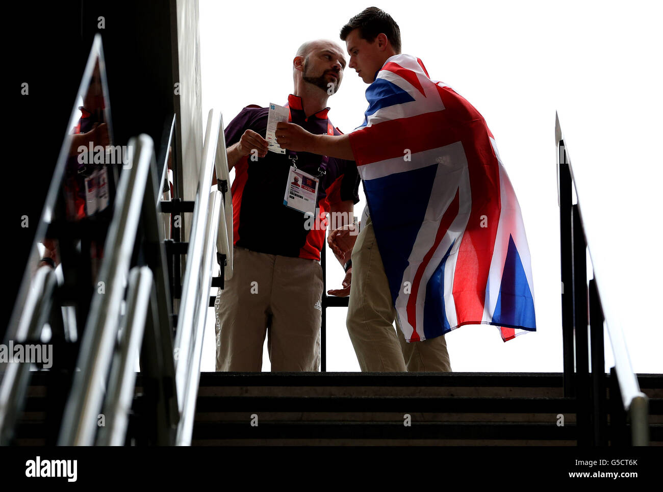 London Olympic Games - Day 12. A spectator has his ticket checked as he ...