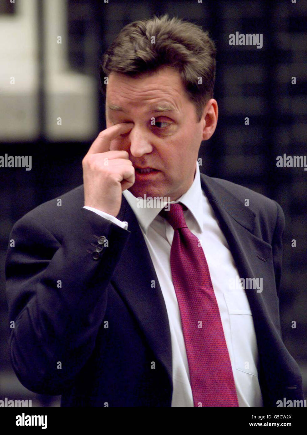 Health Secretary Alan Milburn leaves Downing Street, London after a ...