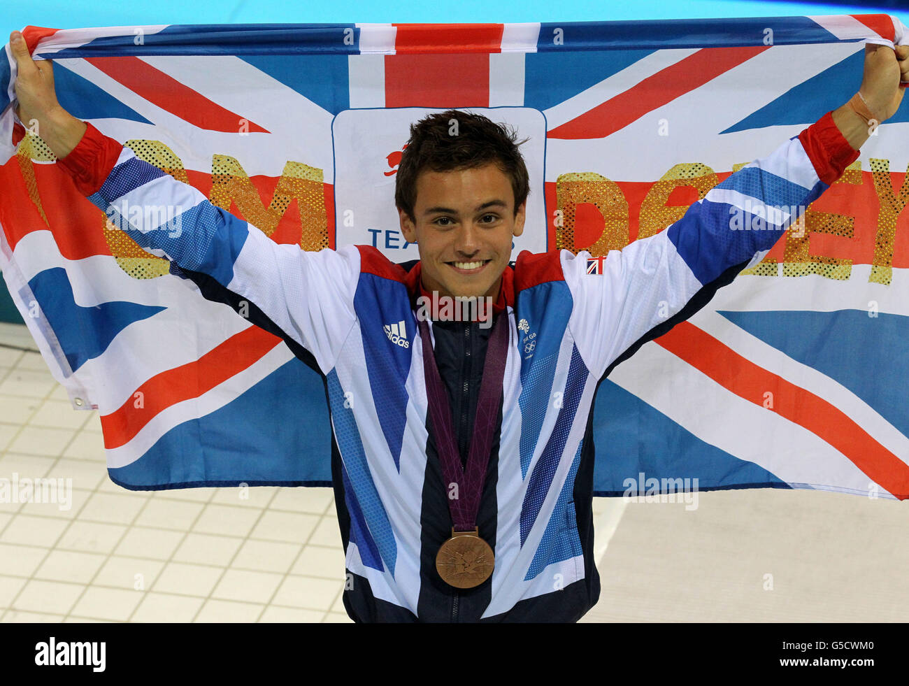 Great Britain's Tom Daley as he celebrates his Bronze medal in the Men ...