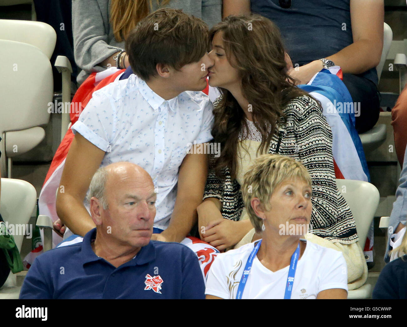 Louis Tomlinson from the band One Direction with partner Eleanor Calder ...