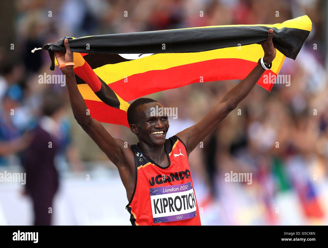 Uganda's Stephen Kiprotich celebrates his win the men's marathon in ...