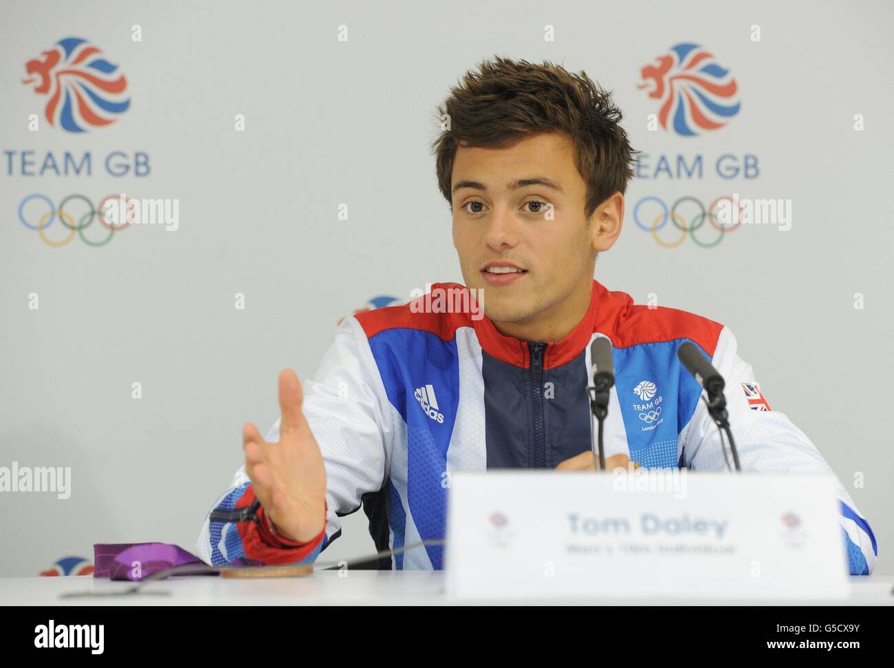 Tom Daley speaks during a press conference at GB House in Stratford ...