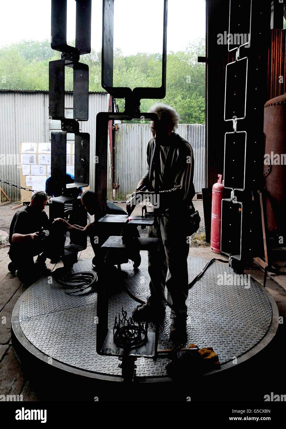 One of 75 blacksmiths working on a new sculpture, taking inspiration ...