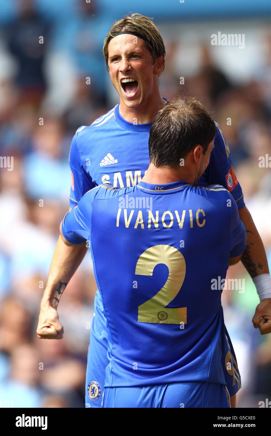 Chelsea's Fernando Torres (left) celebrates scoring their first goal of ...