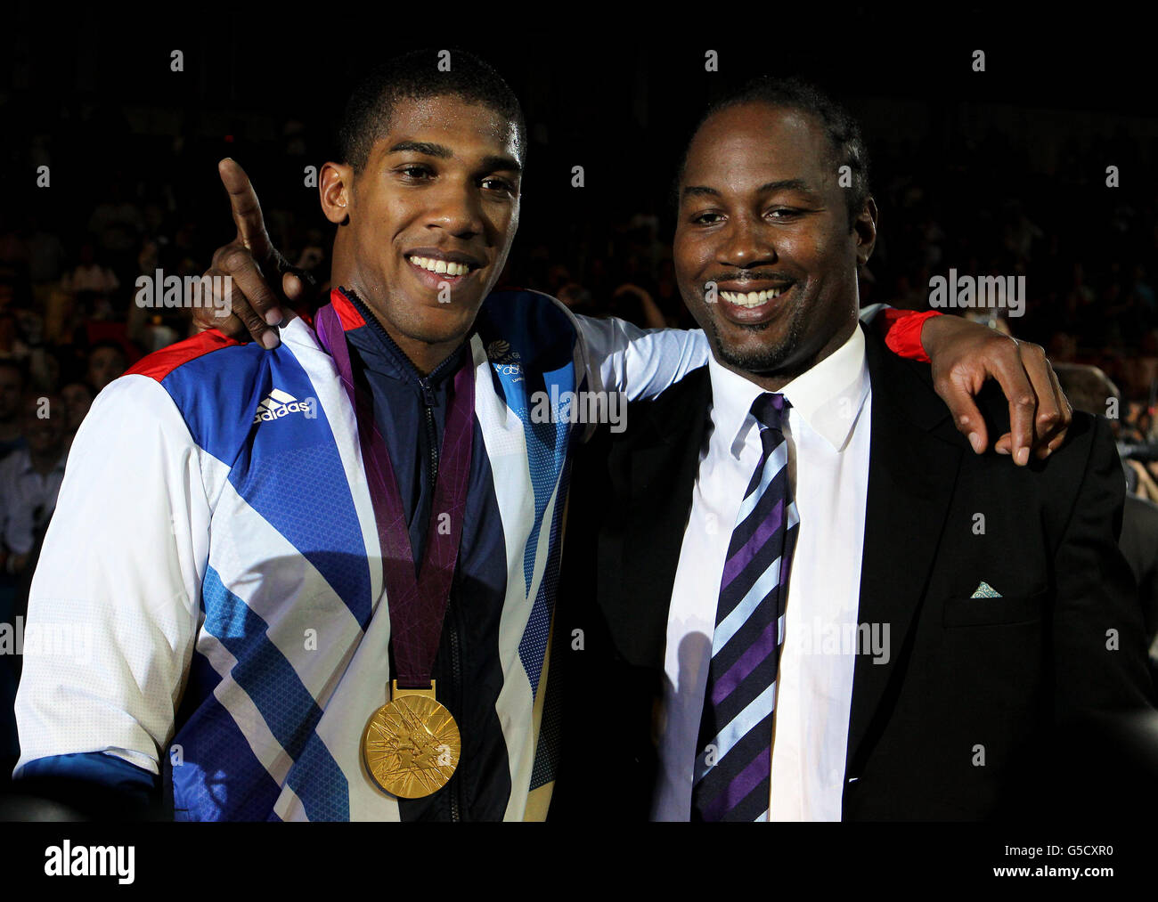 Great Britain's Anthony Joshua poses with former gold medalist Lennox ...