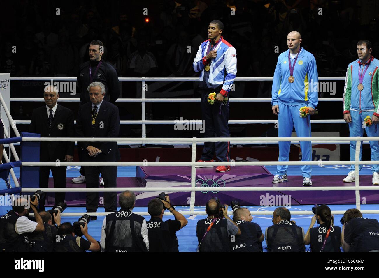 Great Britain's Anthony Joshua (centre) celebrates his gold medal ...