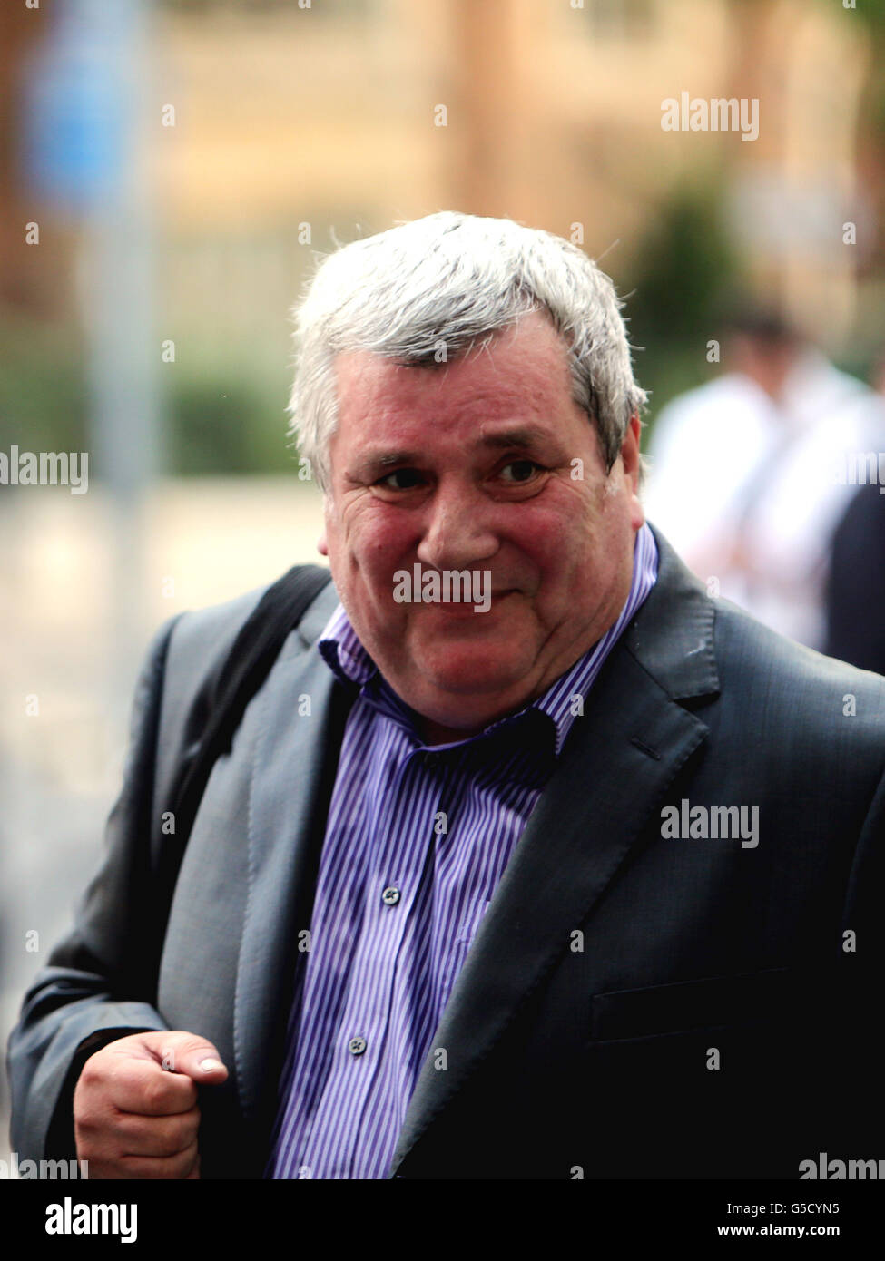 Former News of the World news editor Greg Miskiw arrives at Westminster ...