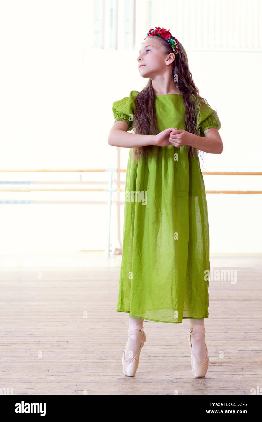 Ballet studio. Artistic ballerina posing at camera Stock Photo - Alamy