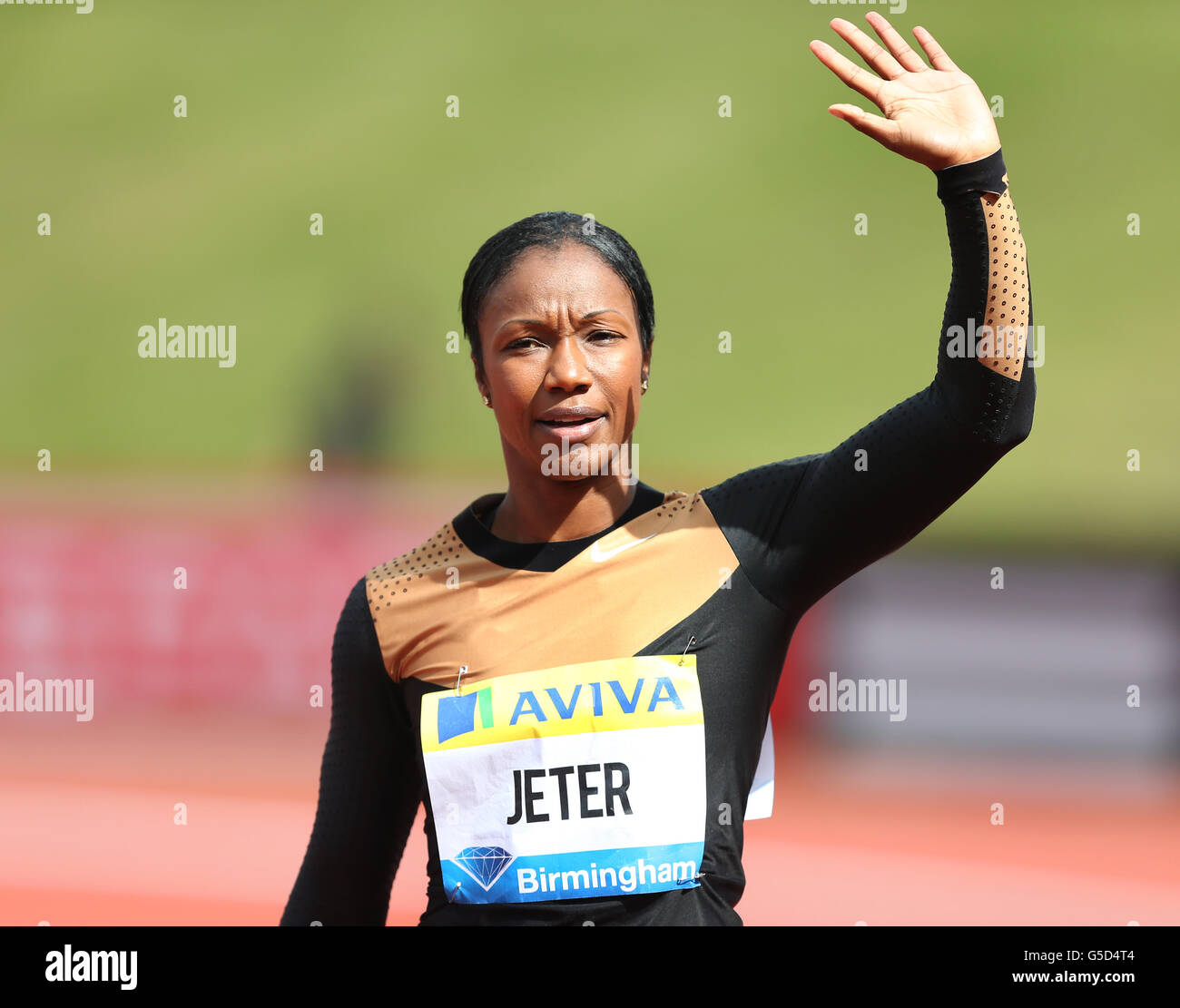 United States' Carmelita Jeter waves to fans after competing in the ...