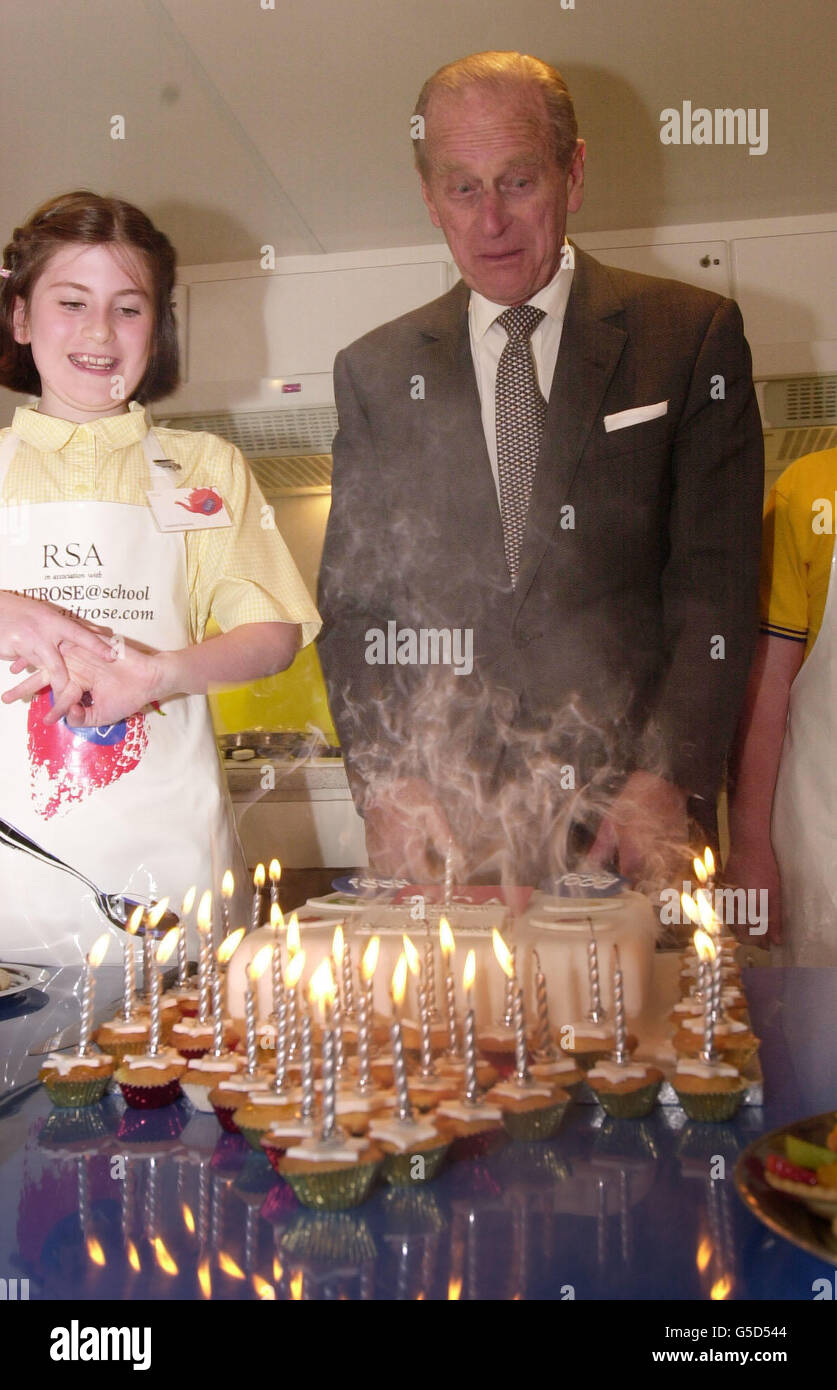 The Duke of Edinburgh serves some of the low-fat birthday cake he ...