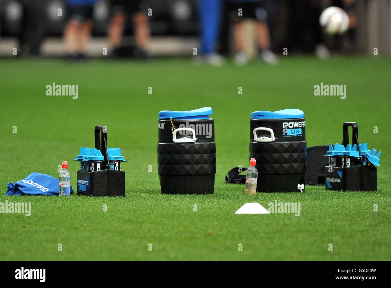 A general view of Powerade drinks holders, bottles and buckets on the ...