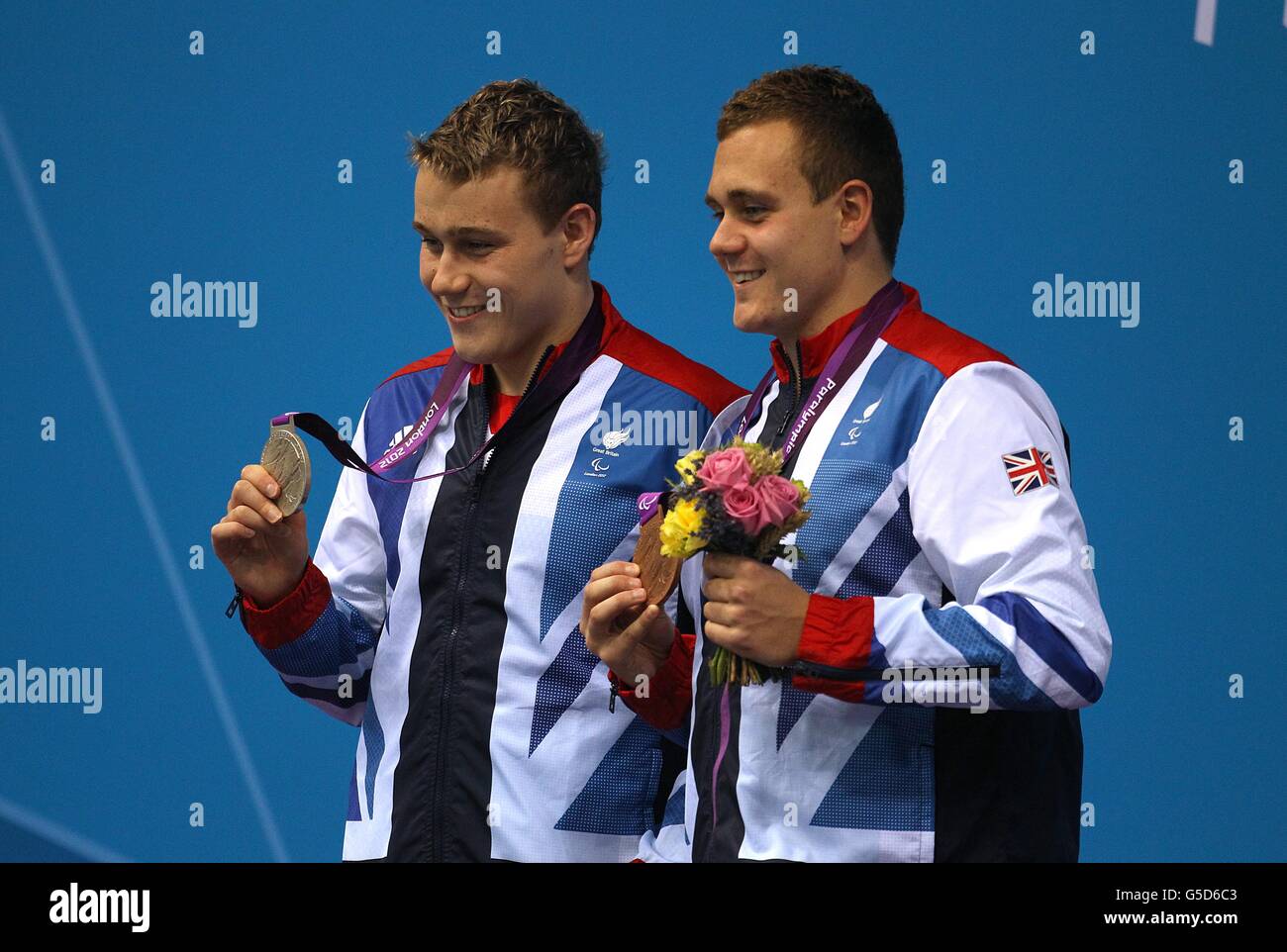 Great Britain's Oliver Hynd and Sam Hynd (right) celebrate winning the ...