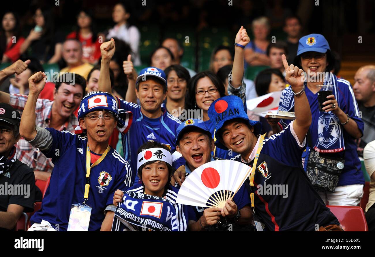 Japan fans show their support in the stands hi-res stock photography ...