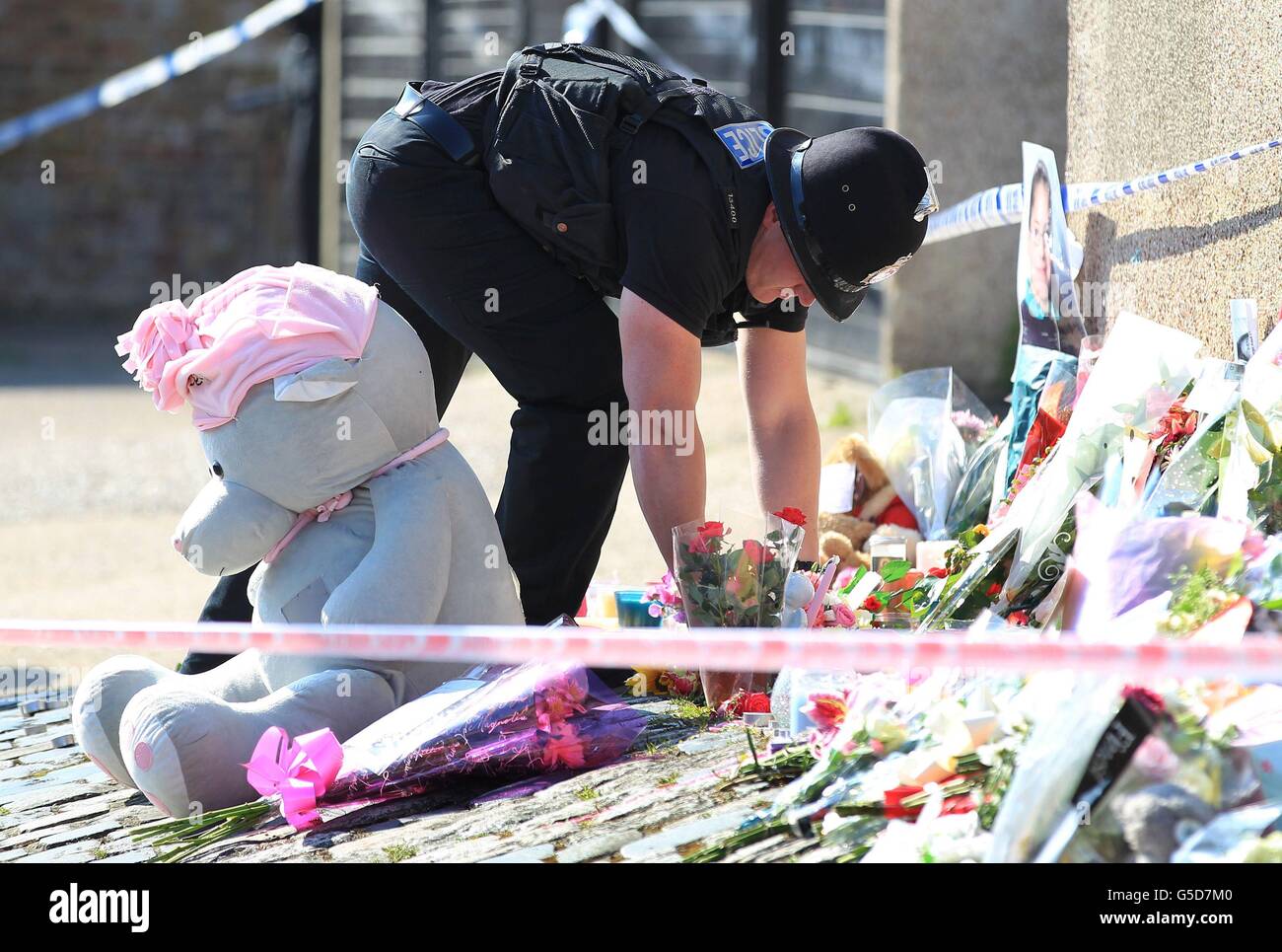 Floral tributes make shift memorial tia sharp in new addington hi-res ...