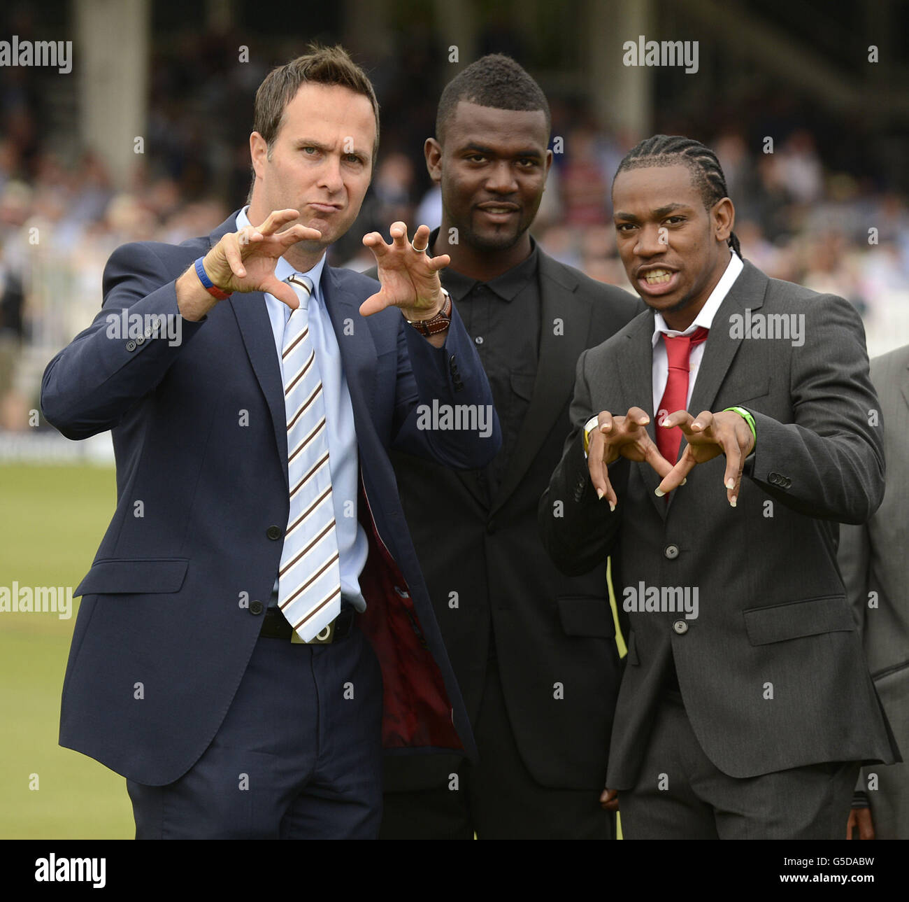 Former England Captain, Michael Vaughan (left) poses for a picture with ...