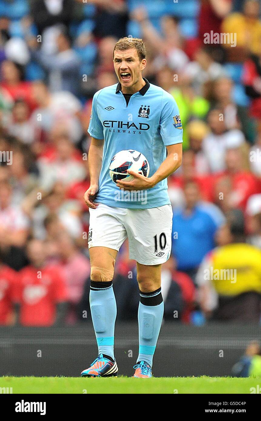 Edin dzeko manchester city celebrates hi-res stock photography and ...