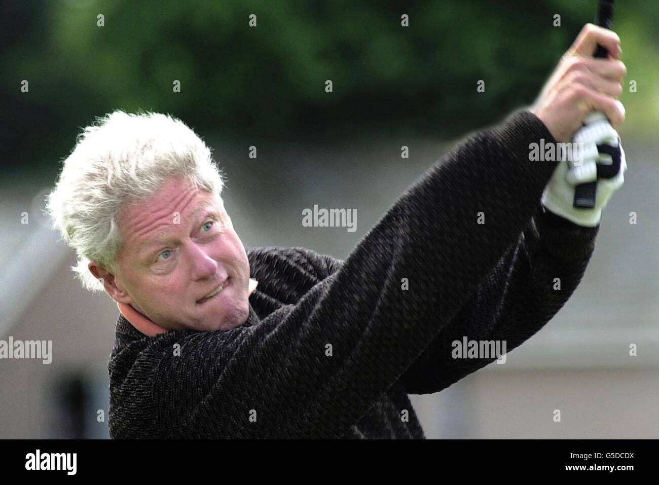 Former American President Bill Clinton plays off the second tee at the ...